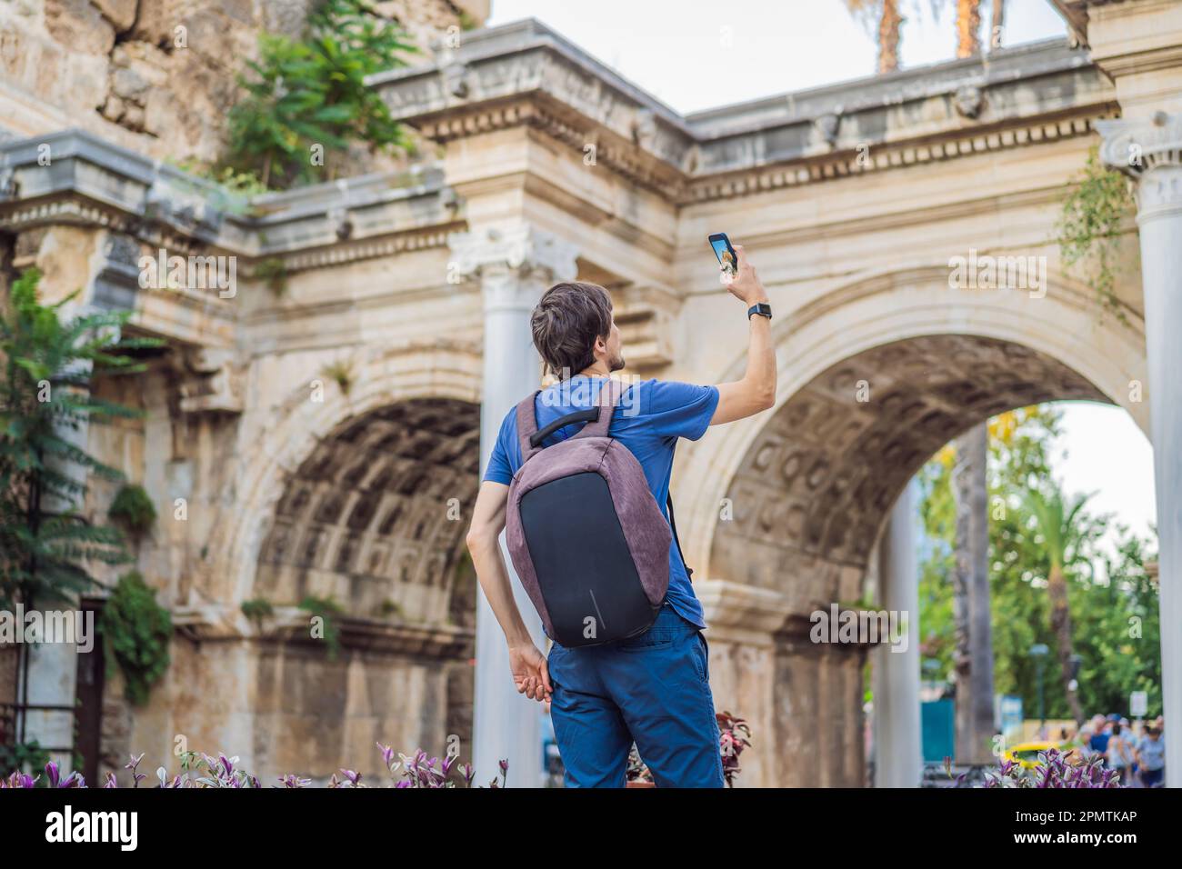 Happy male tourist traveler discover interesting places and popular ...