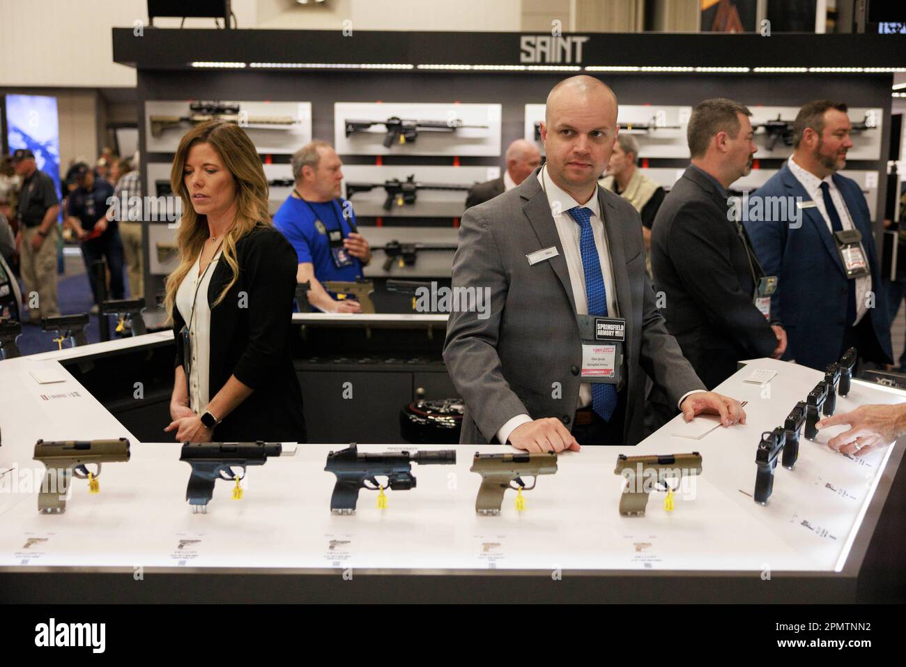 INDIANAPOLIS, INDIANA - APRIL 14: Workers wait to talk with guests at ...
