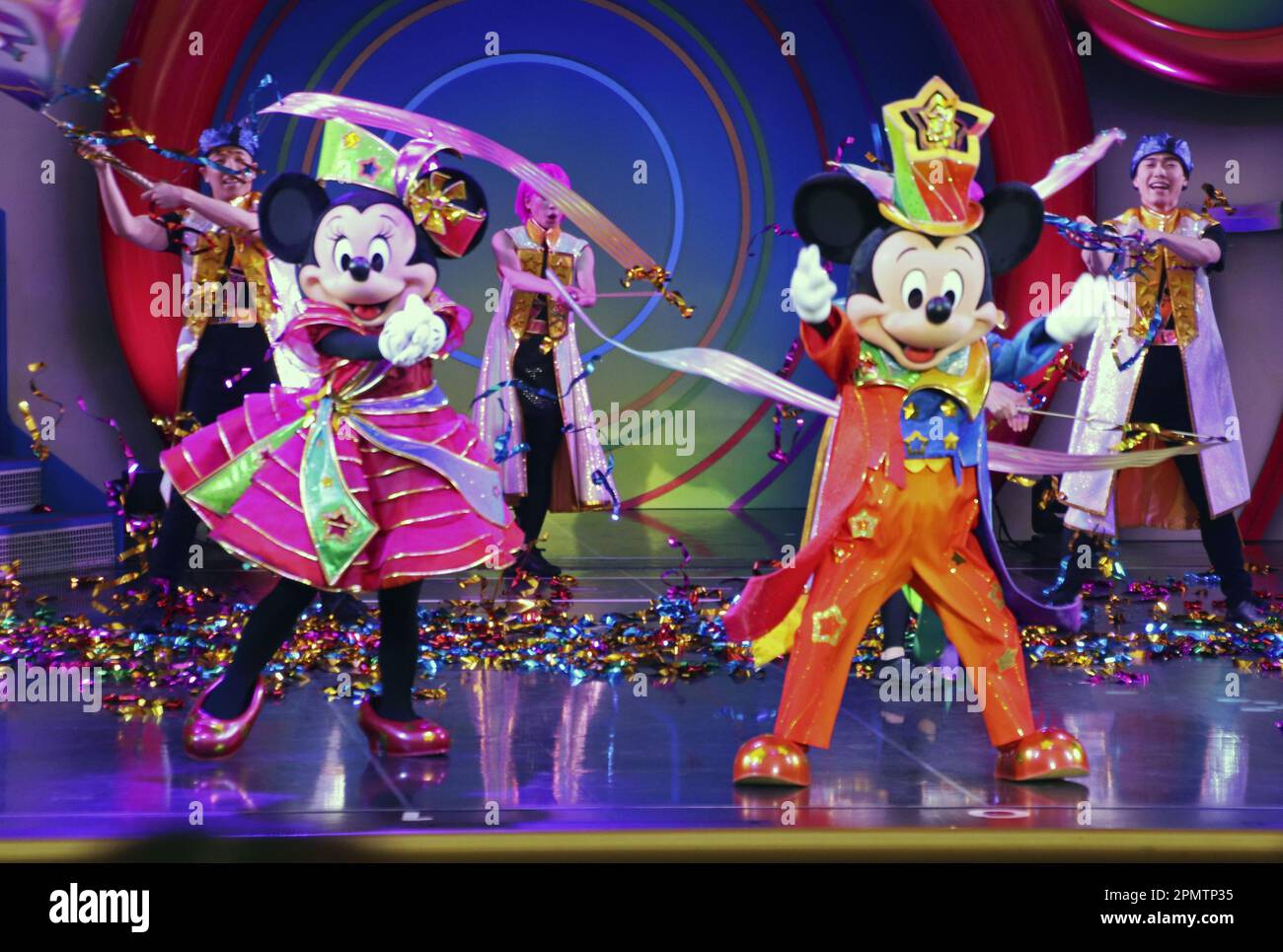 Mickey Mouse and Minnie Mouse dance during a ceremony marking the 40th ...