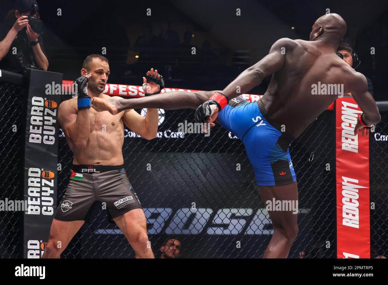April 14, 2023: (R-L) Welterweight Sadibou Sy throws a kick at Jarrah ...