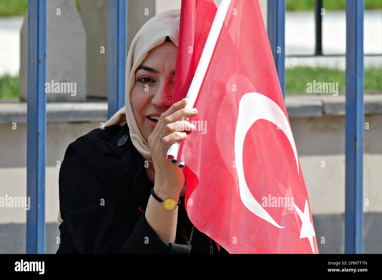 An Justice and Development Party (AKP) sympathizer uses the flag as a ...