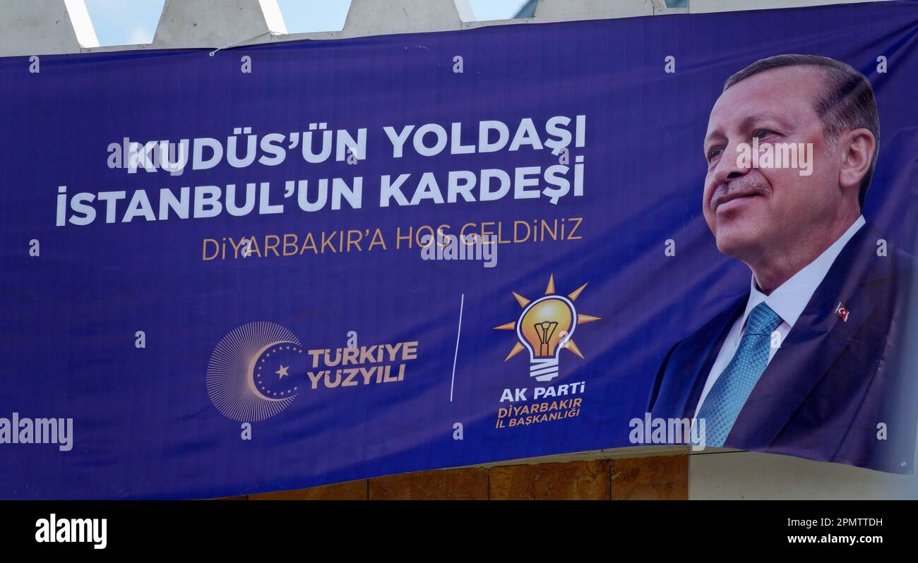 A poster of President Erdogan hang on the main entrance of the mosque ...