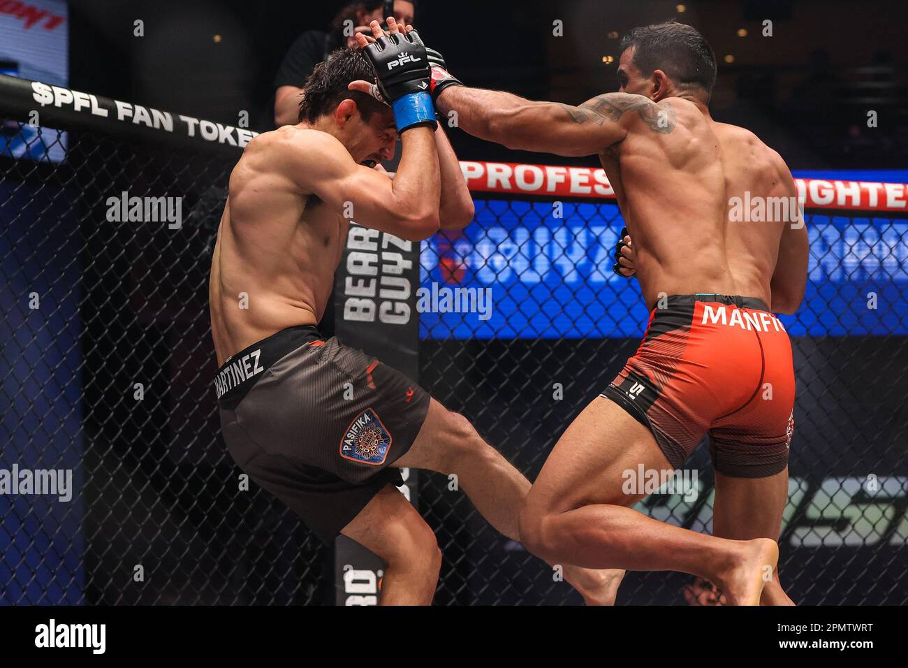 April 14, 2023: (R-L) Lightweight Raush Manfio punches Alexander Martinez during the PFL 3 ...
