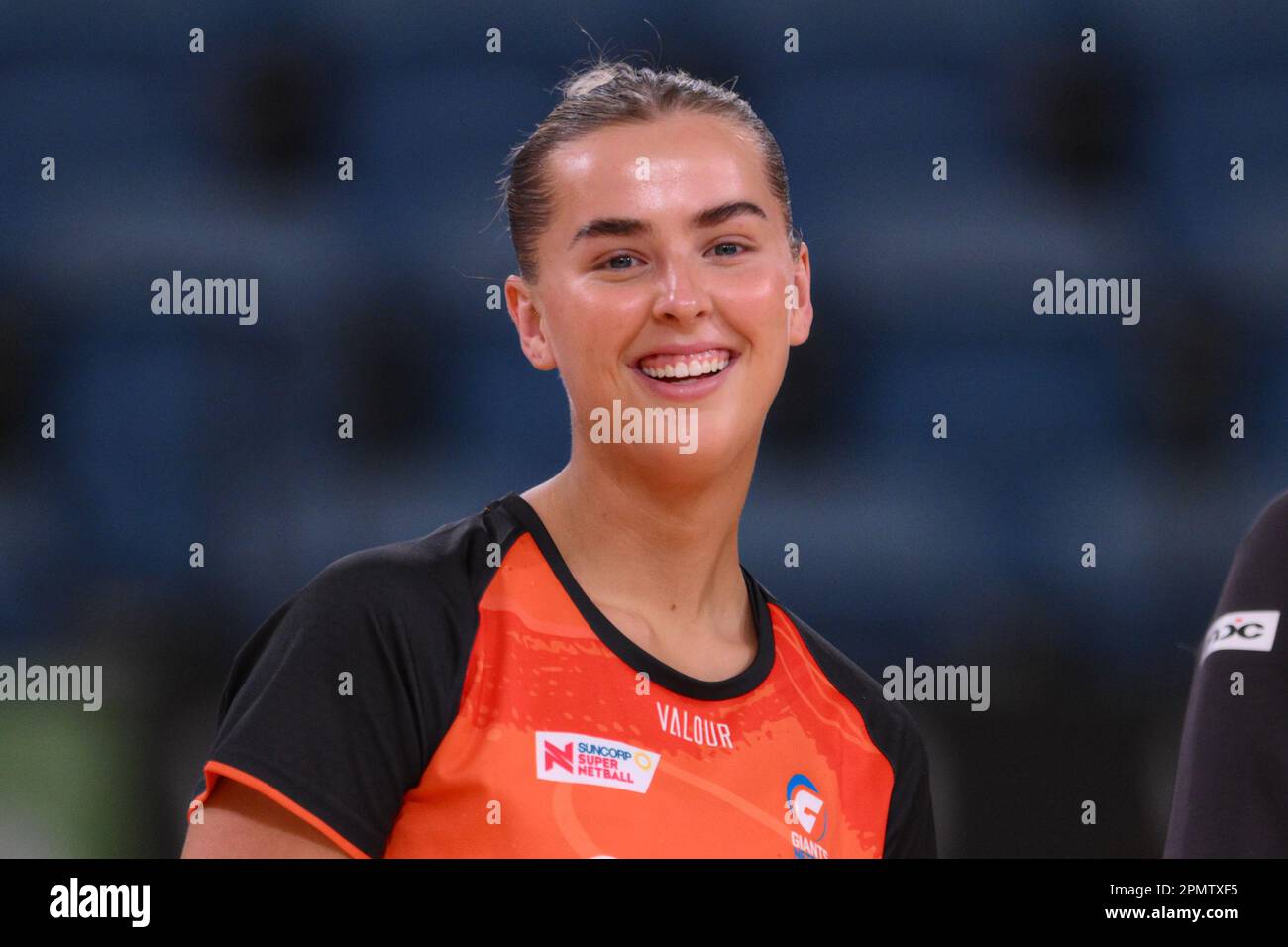 Matisse Letherbarrow of the Giants warms up before the Super Netball ...