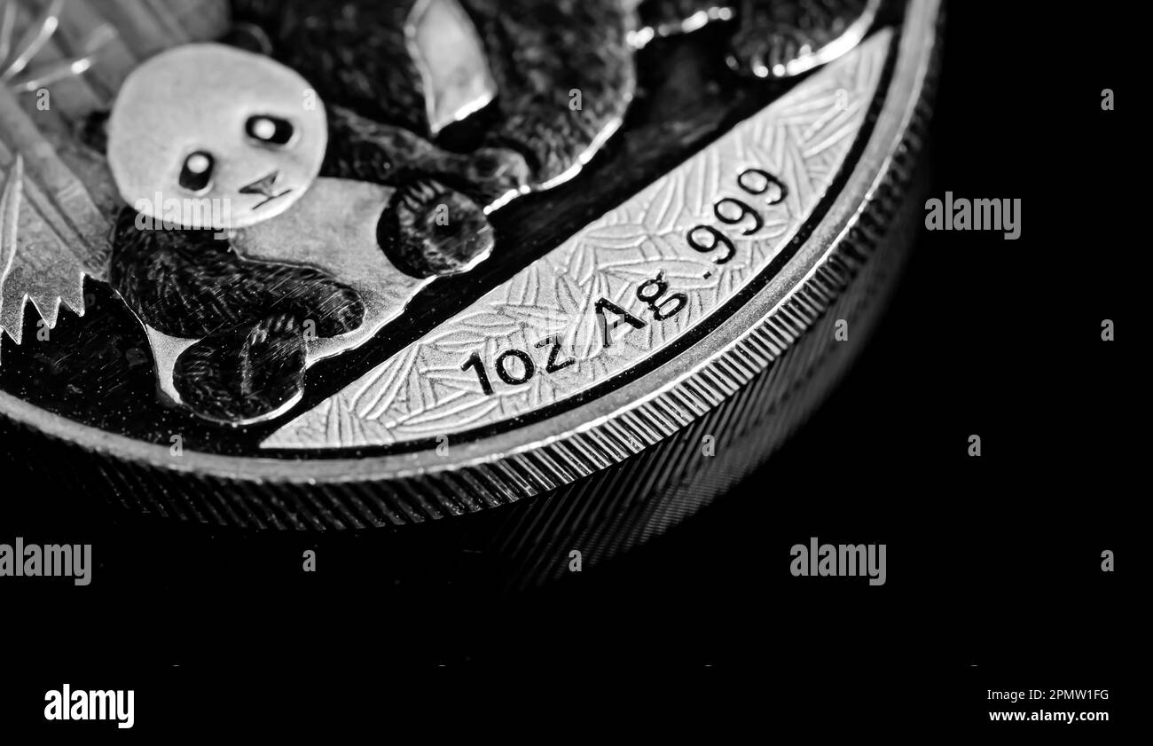 A grayscale closeup of silver coin Stock Photo - Alamy