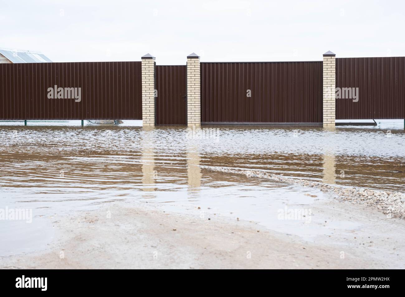 Spring flood in rural areas - flooding of the river, flooding of house ...