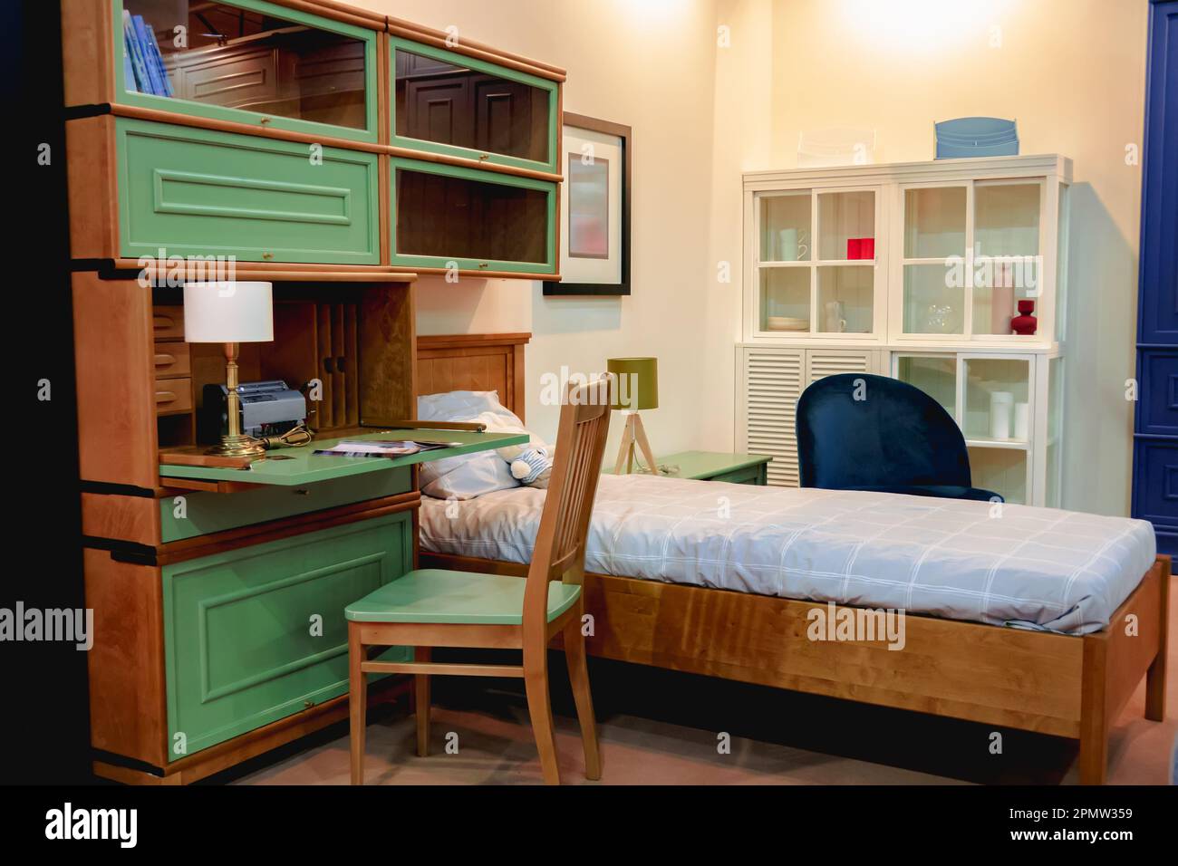 Bedroom with office. Single bed with wardrobe and work desk Stock Photo ...