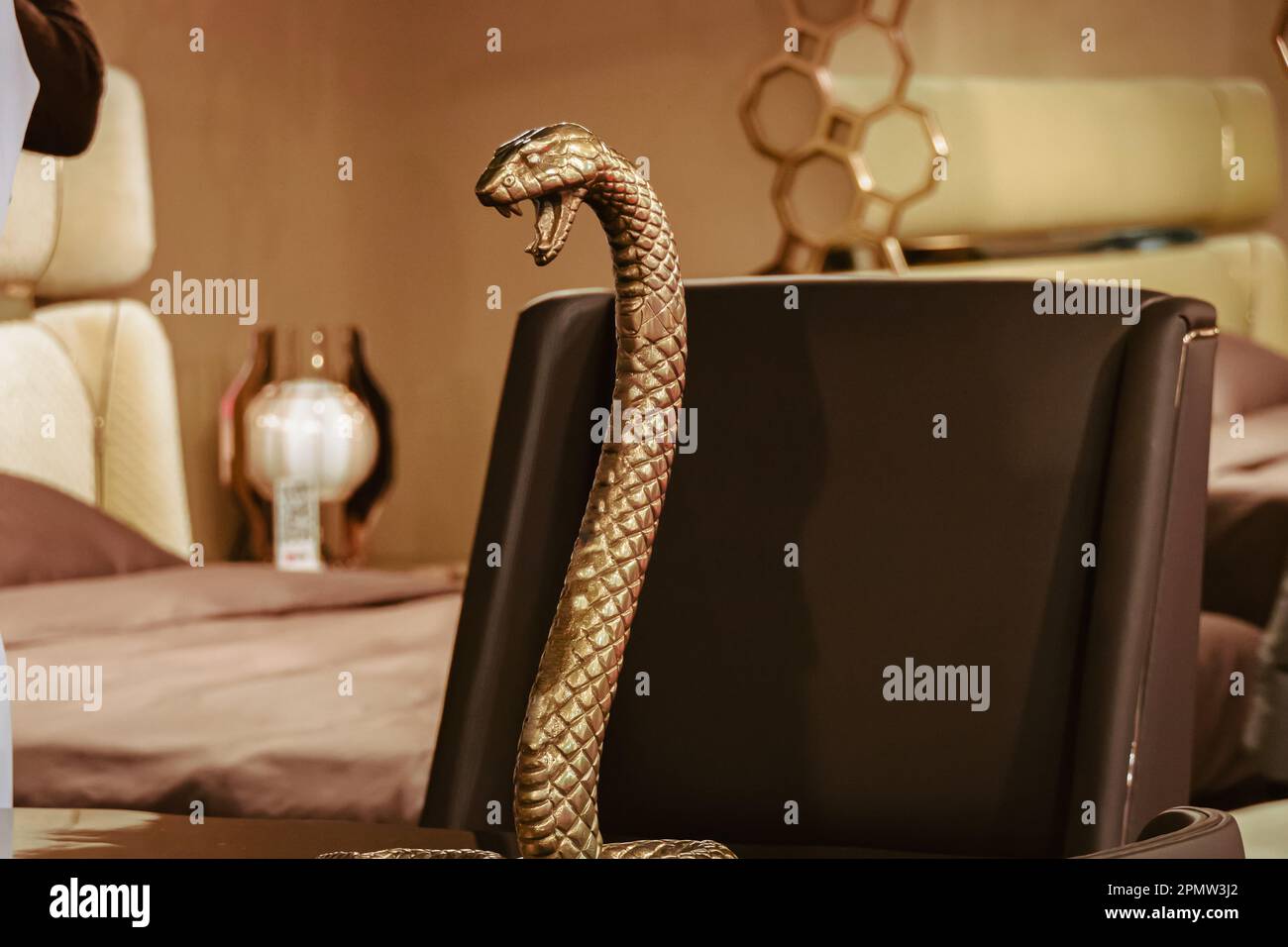 Decorative desktop decoration snake with open mouth Stock Photo - Alamy