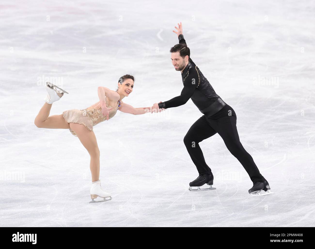 Deanna STELLATO-DUDEK and Maxime DESCHAMPS of Canada perform during ...
