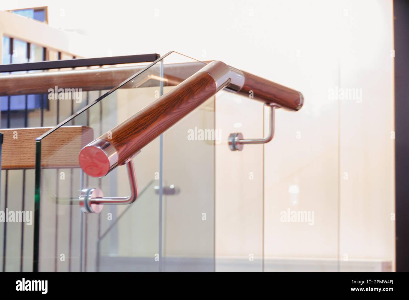 Round wooden railing on glass surface Stock Photo - Alamy