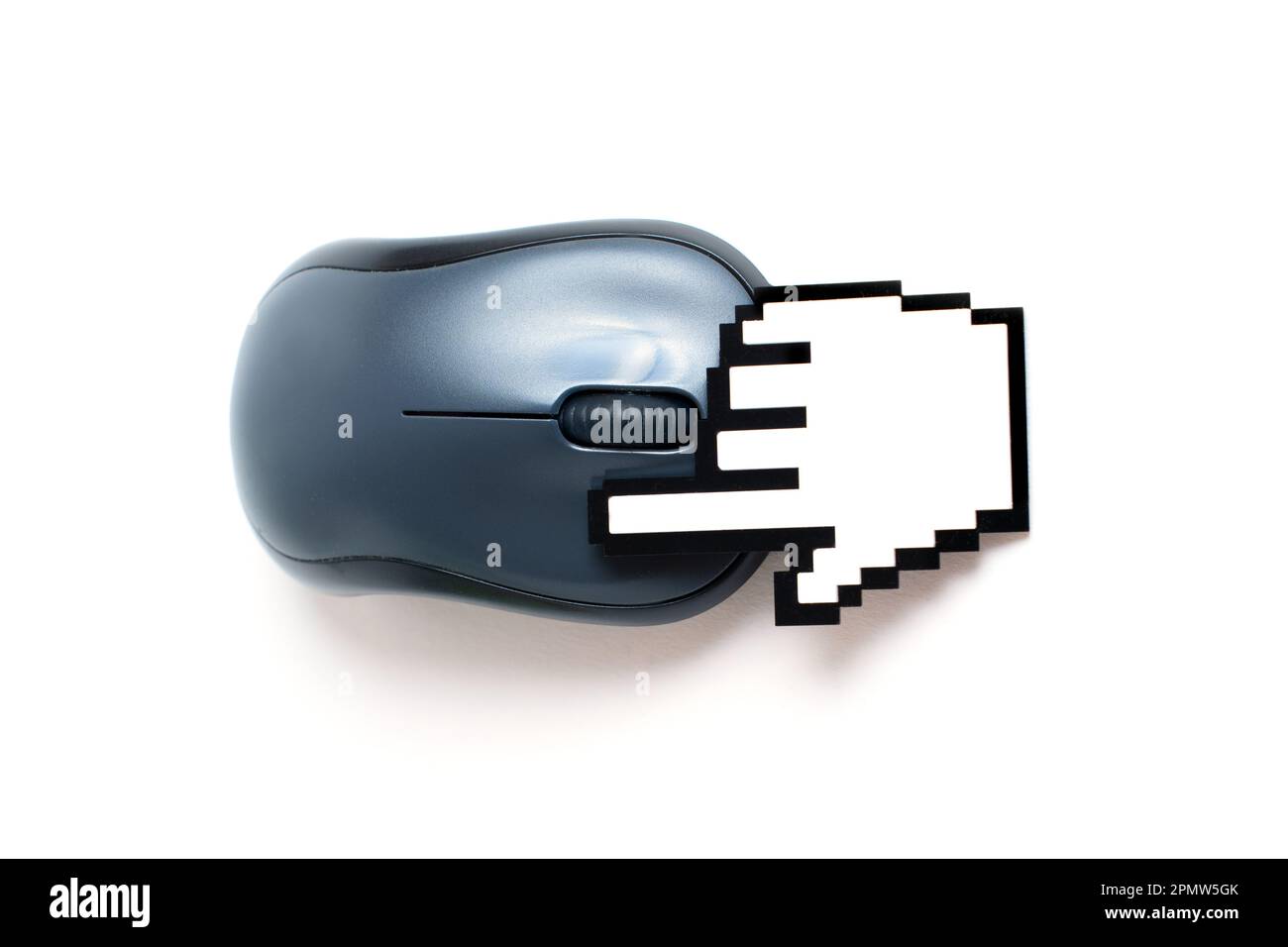 Large pixel hand mouse pointer shaped figurine clicks on a computer ...