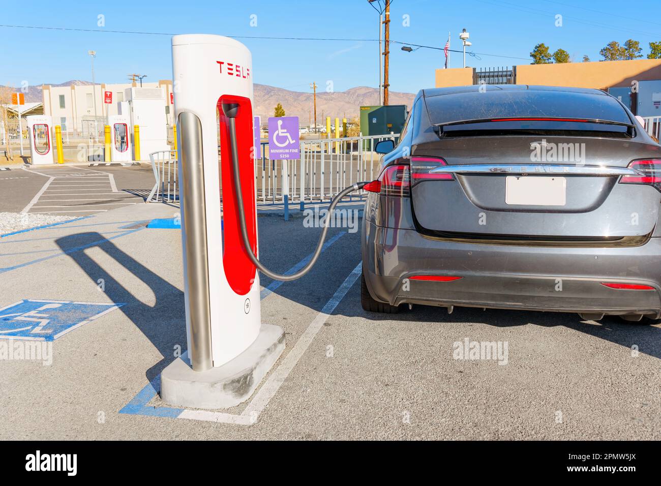 California, USA - December 23, 2022: Back view of a Tesla car being ...
