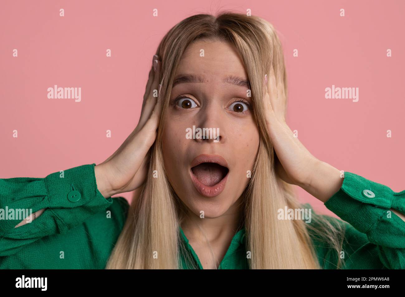 Oh my God, Wow. Excited amazed winner woman surprise looking at camera ...