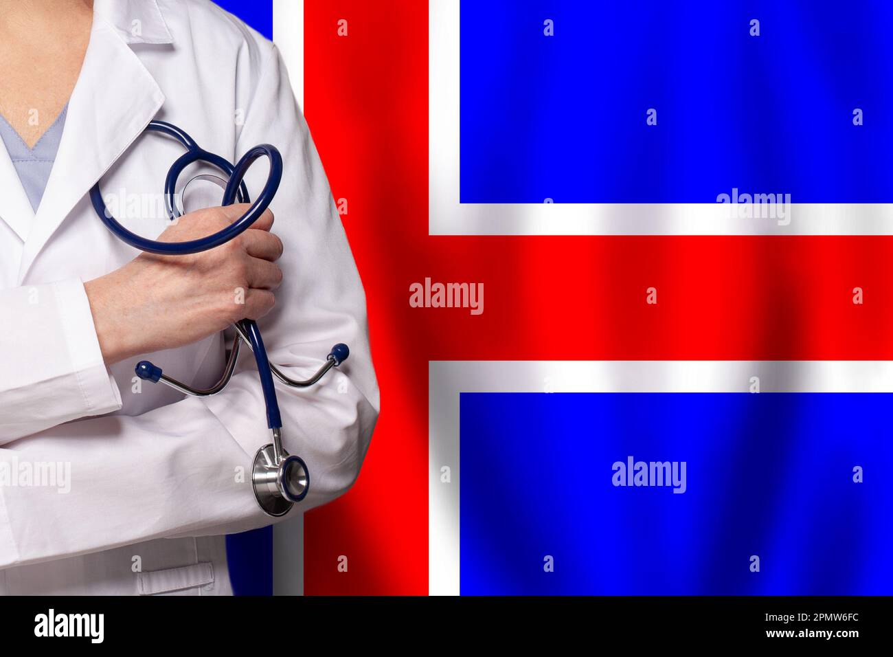 Icelandic medicine and healthcare concept. Doctor close up against flag ...