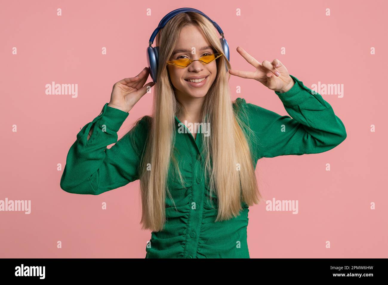 Pretty woman in headphones listening music, smiling dancing disco party ...