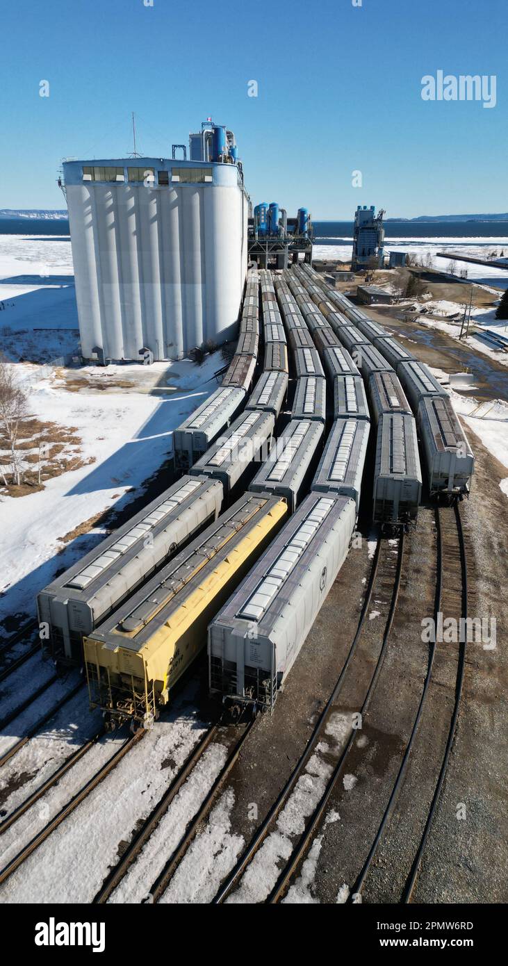 A high-angle shot of trains docked in the Lake Superior elevators ...