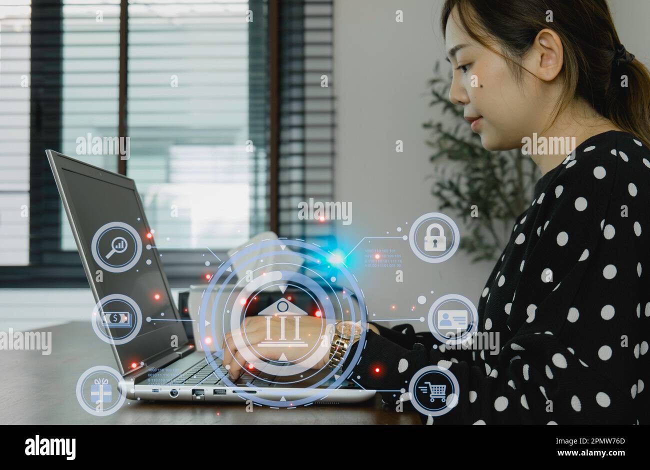 Businesswoman typing on laptop and hologram of hud with bot icon and ...