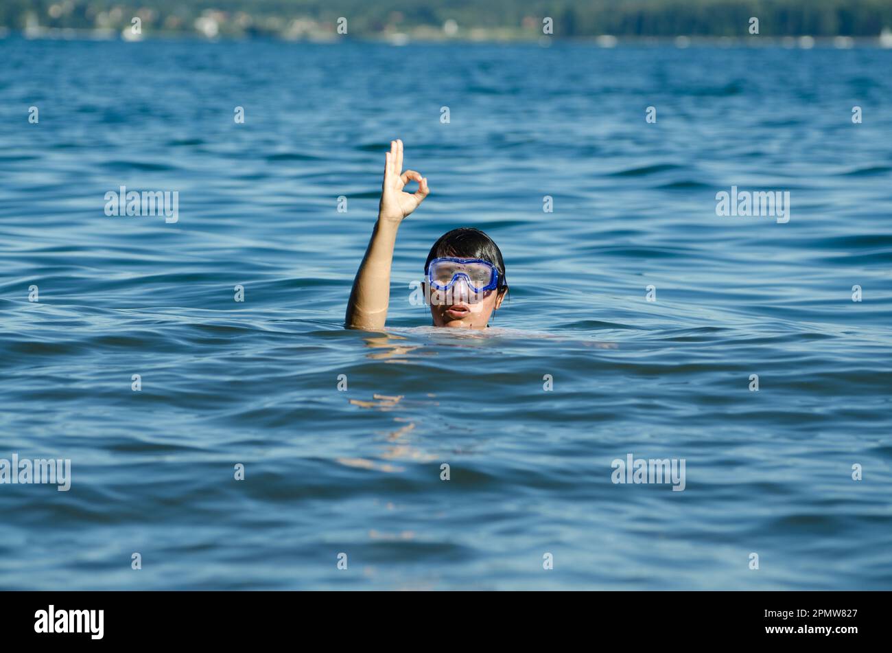 Woman with Diving Mask in the Water and Showing the OK Signal Stock ...