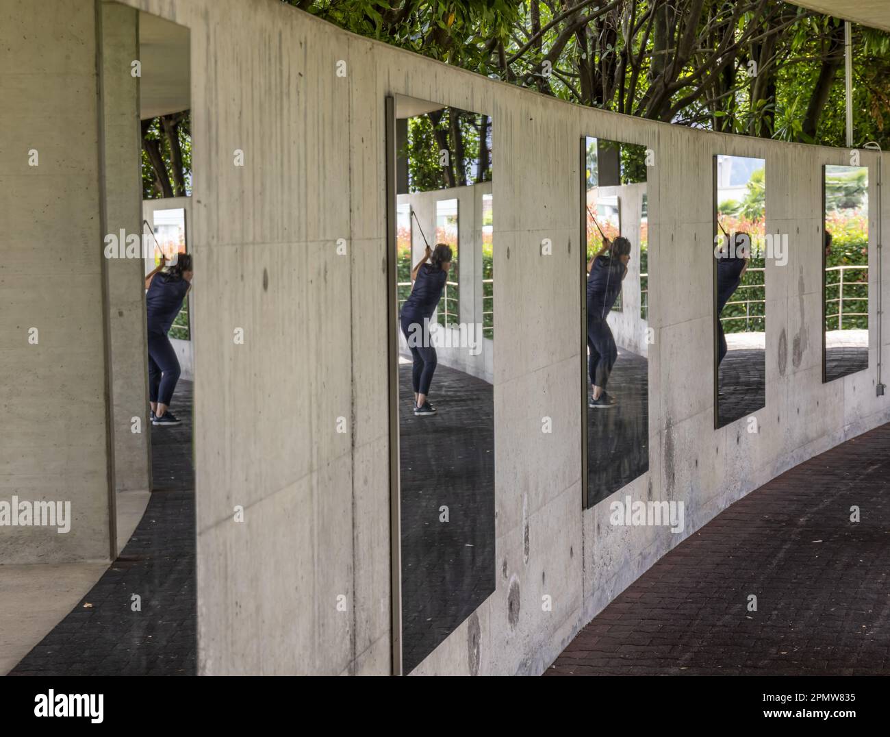 Golfer Practice in Driving Range Her Golf Swing and Mirror Image in ...