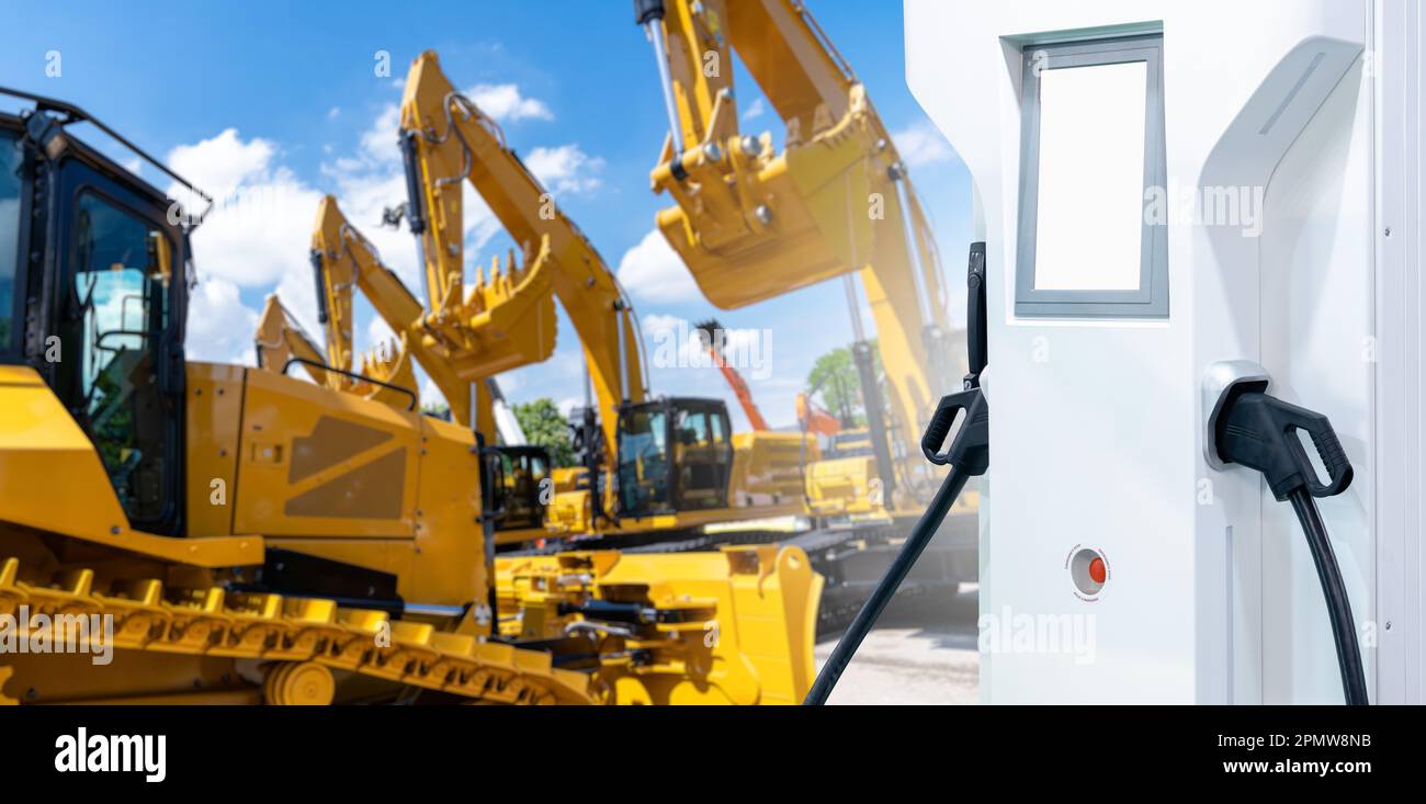 Electric construction machines with charging station. Concept. High ...