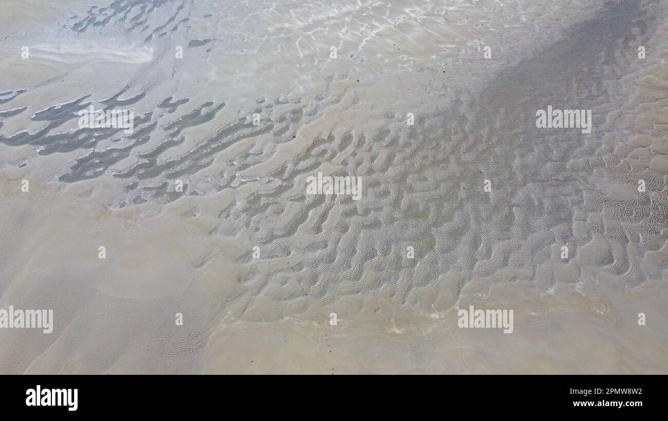 sand at low tide, top view. Unusual sandy texture Stock Photo - Alamy