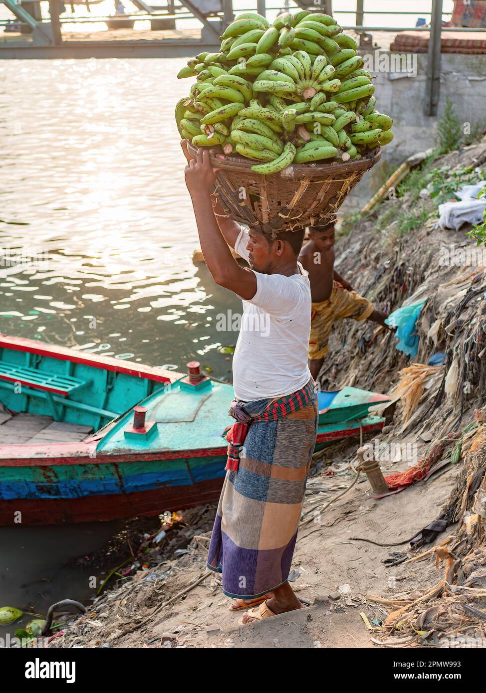 Bunch of bananas on the head hi-res stock photography and images - Alamy