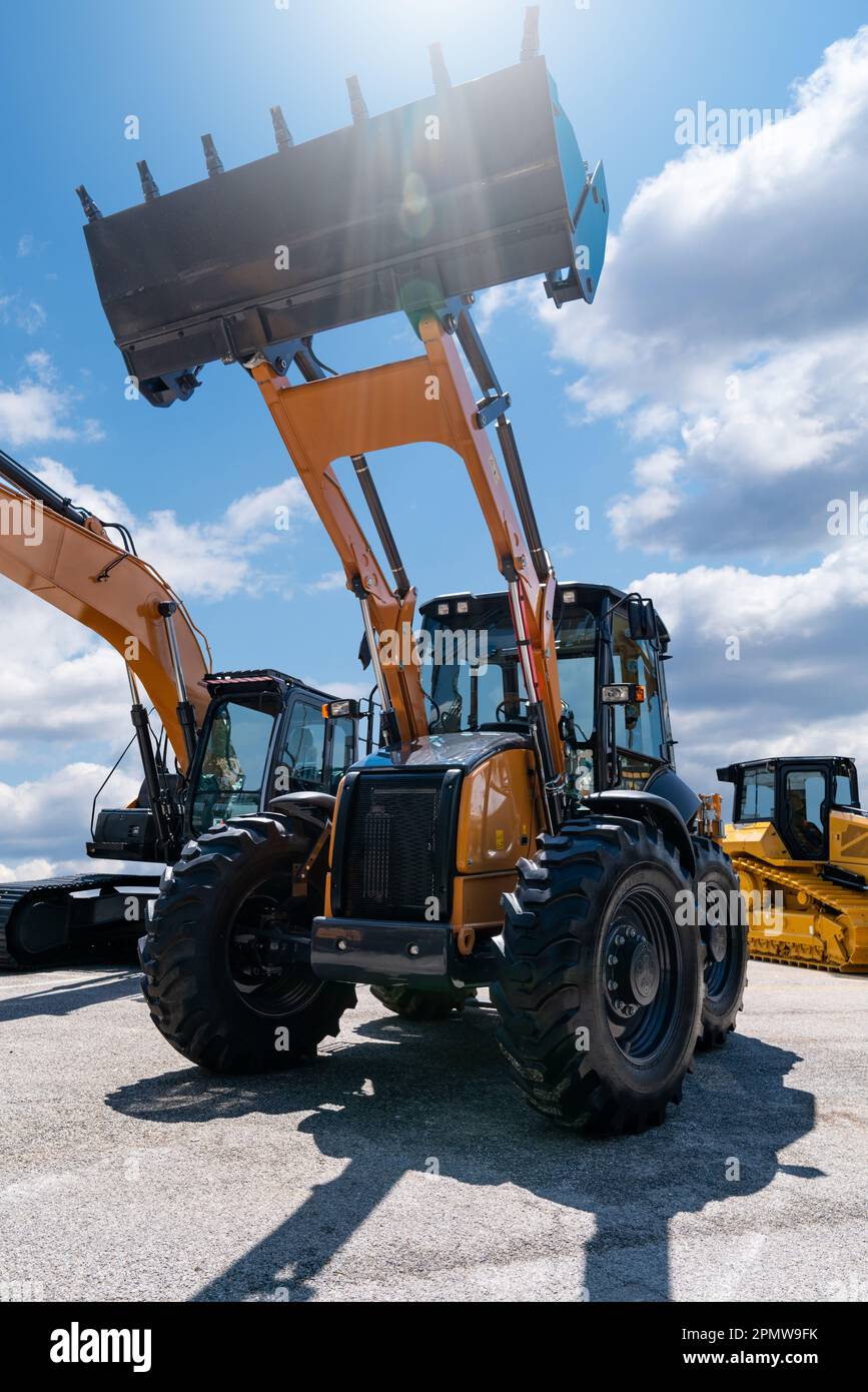 Fleet of yellow construction machines. High quality photo Stock Photo ...