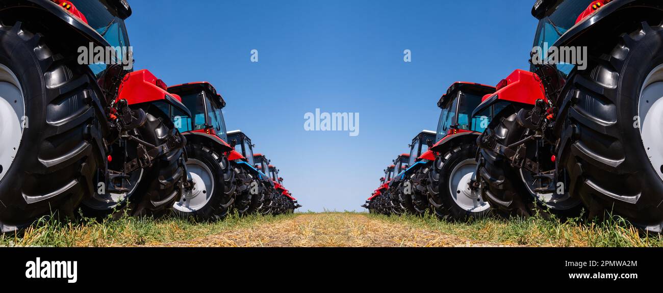 Agricultural tractors on a field. High quality photo Stock Photo - Alamy