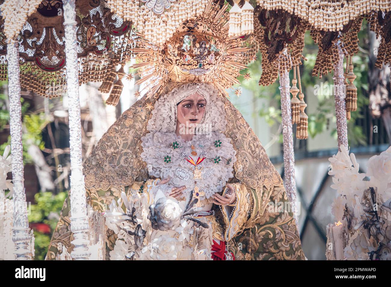 Virgen de la Macarena in the Holy Week procession through the streets ...