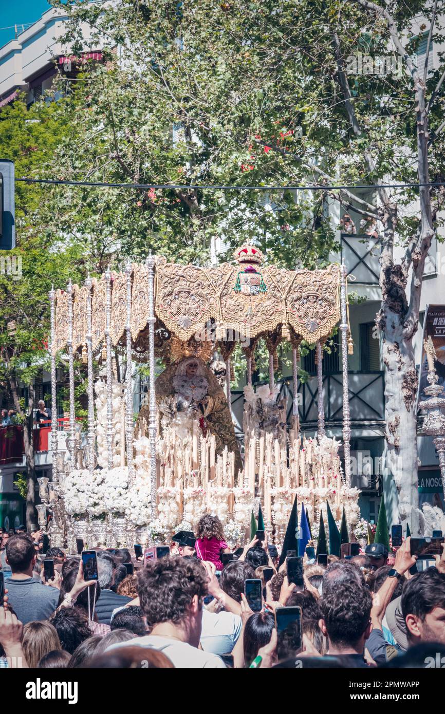 Virgen de la Macarena in the Holy Week procession through the streets ...