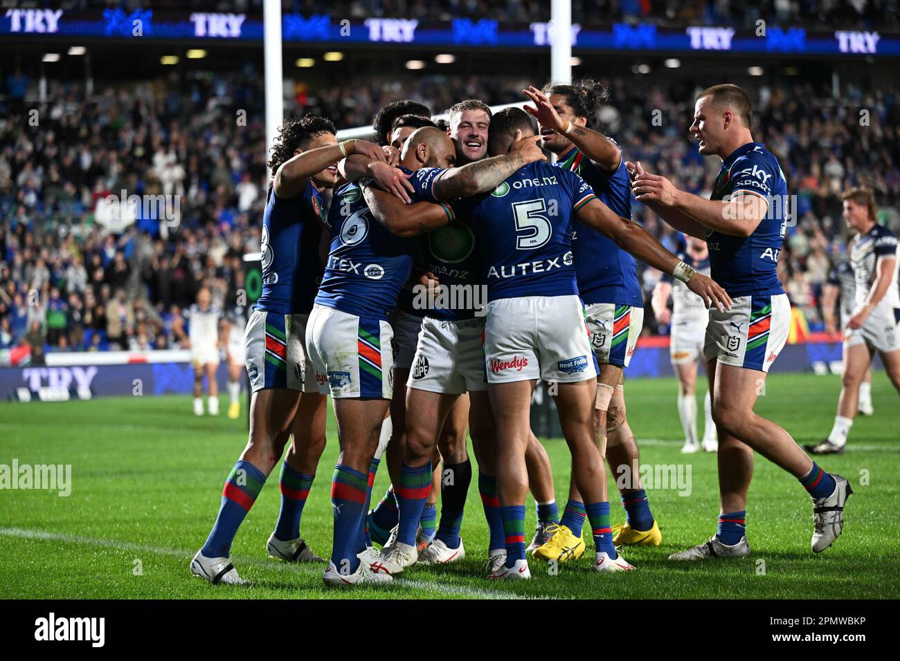 Players celebrate Dylan Walker's try during the NRL Round 7 match ...