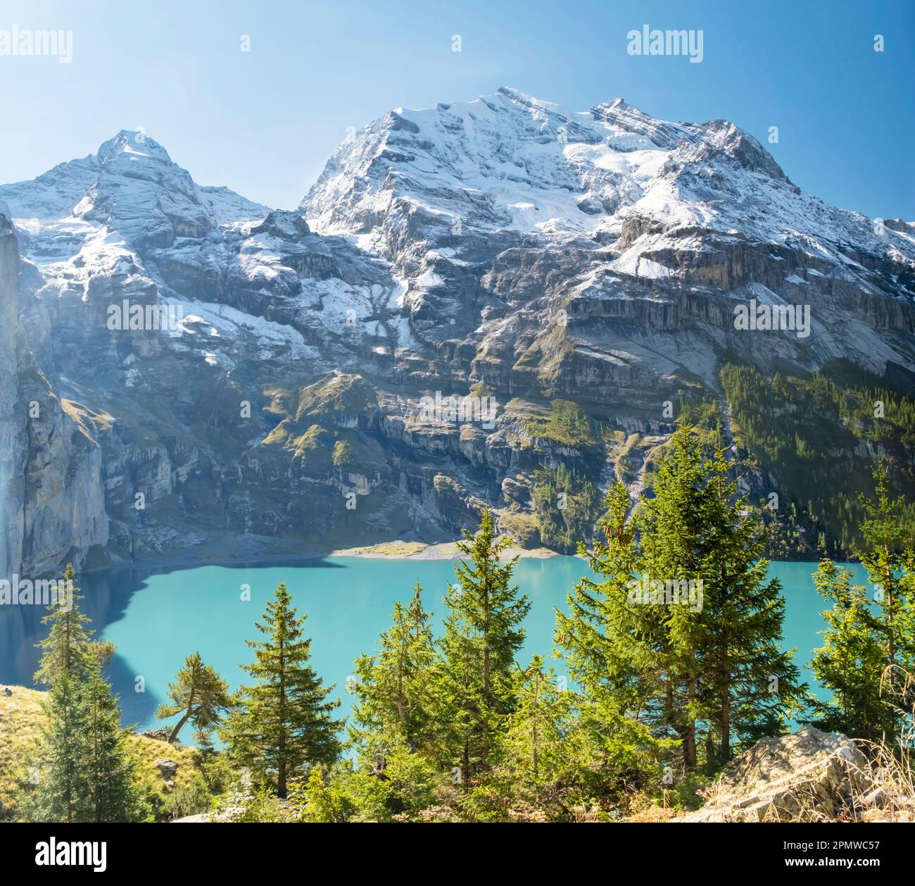 Morning view of lake Oeschinensee. Swiss alps, Switzerland Stock Photo ...