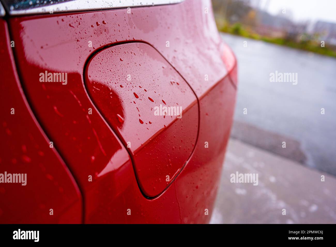 Fine droplets on a red car being washed Stock Photo - Alamy