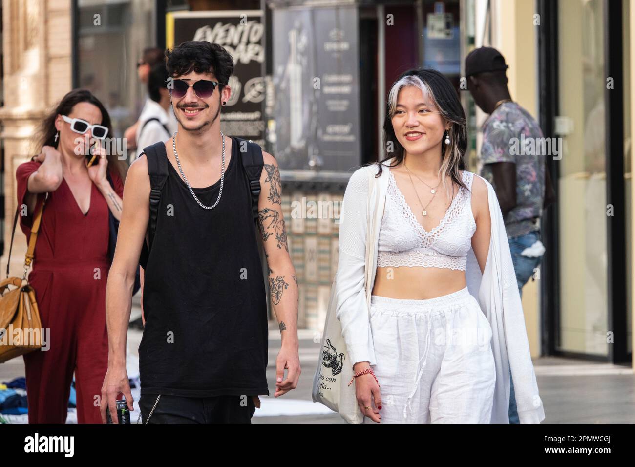 People walking through the streets of European city Stock Photo - Alamy