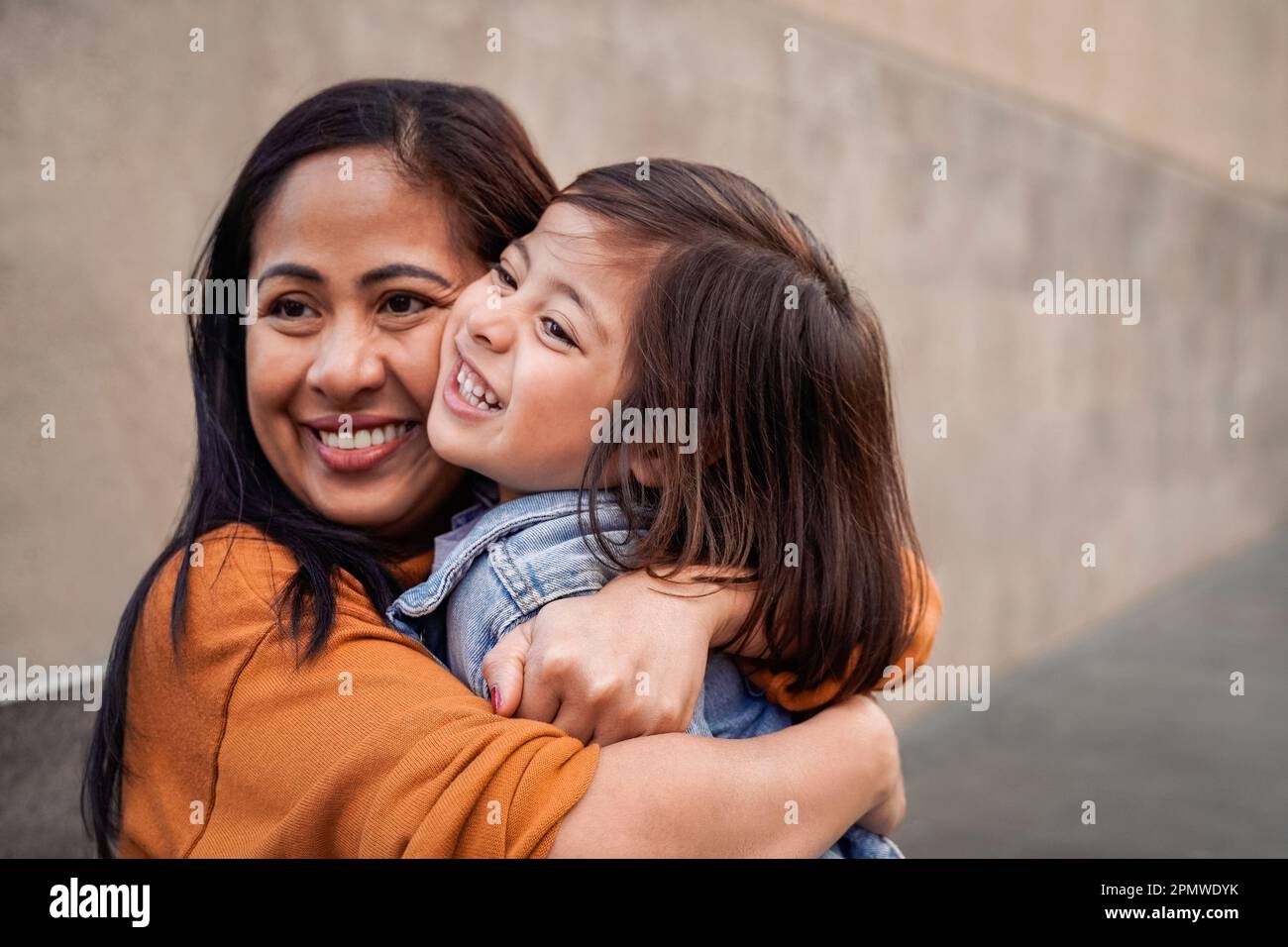 Happy Asian Mother And Daughter Having Fun Together Outdoor Focus On
