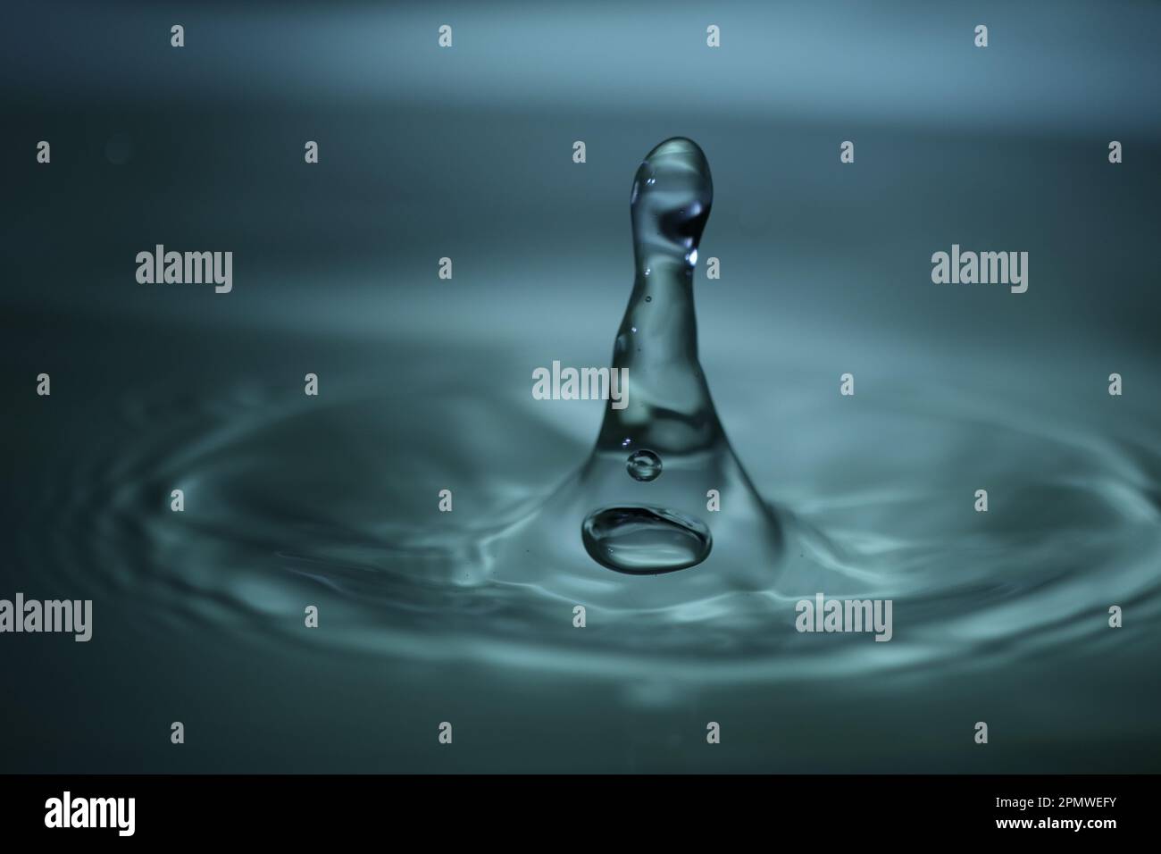Macro Water droplet splashing Stock Photo - Alamy