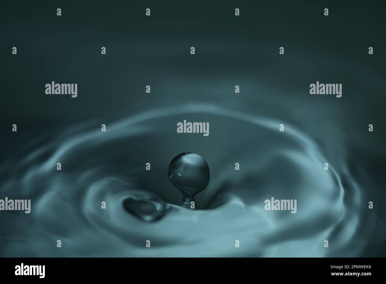 Macro Water droplet splashing Stock Photo - Alamy