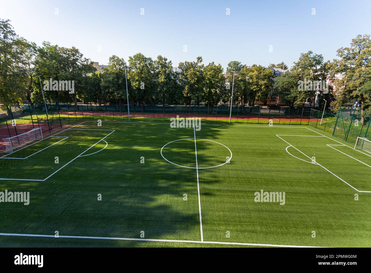 A full-size soccer field with a grass surface Stock Photo - Alamy