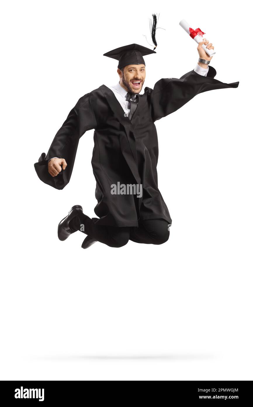 Happy male student in a graduation gown holding diploma and jumping ...