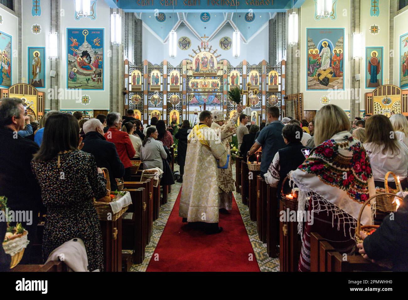 Bishop Fr Mykola Bychok blesses worshippers during a Ukrainian Catholic ...