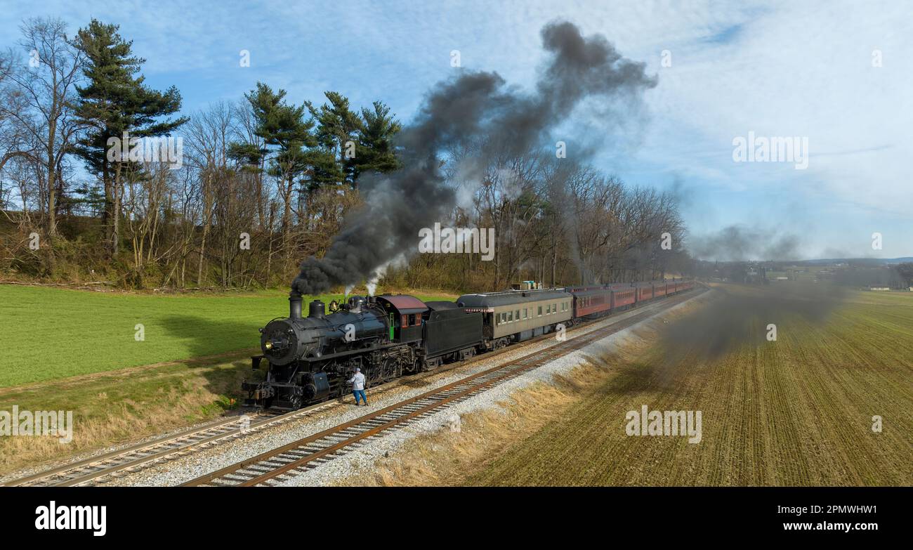 A Slight Forward Aerial View of a Steam Engine Waiting, all Steamed Up ...