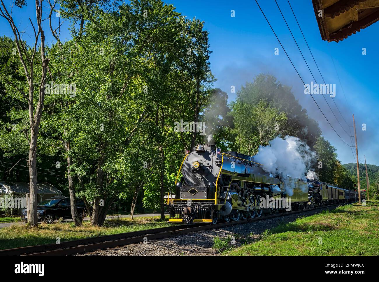 A Head on View of a Double Header Steam Passenger Train, Blowing Smoke ...