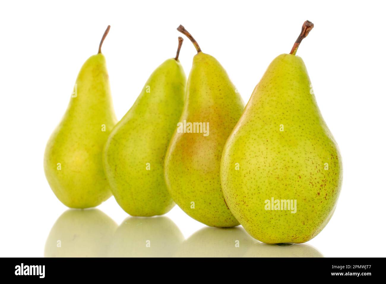 Four whole sweet juicy pears, close-up, on a white background Stock ...