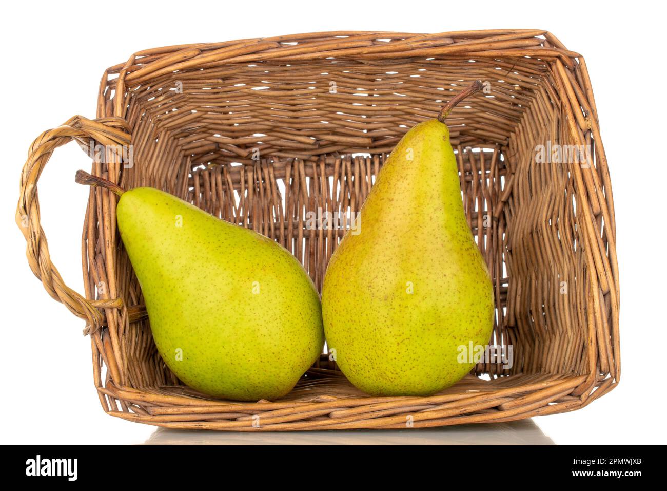 Two organic pears in a basket, close-up, on a white background Stock ...