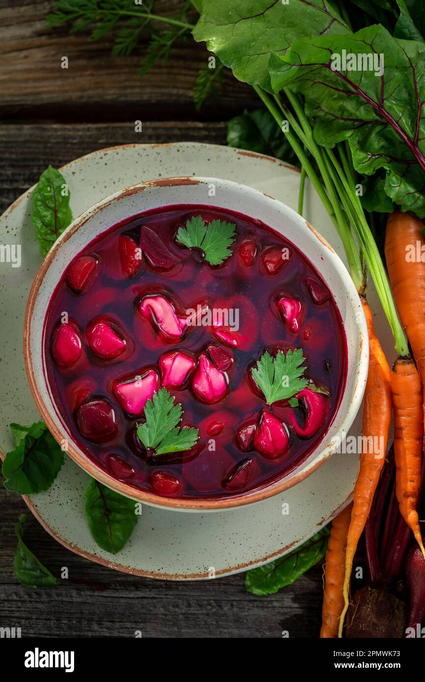 Red and tasty beetroot soup served with dumplings. Homemade Ukrainian ...