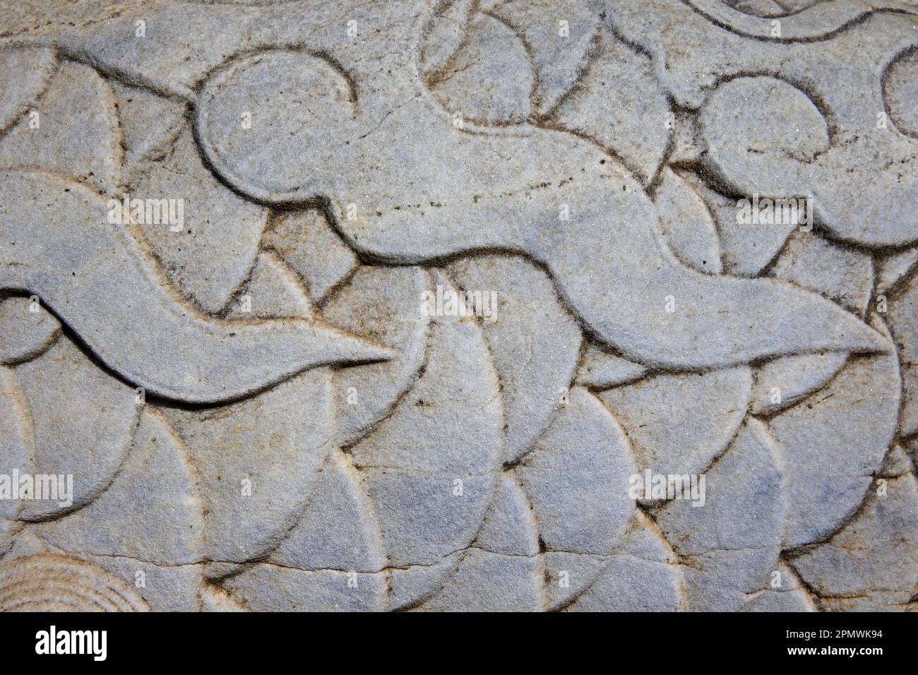 Vintage ornament on the stone. Close-up seamless texture. Stone texture ...