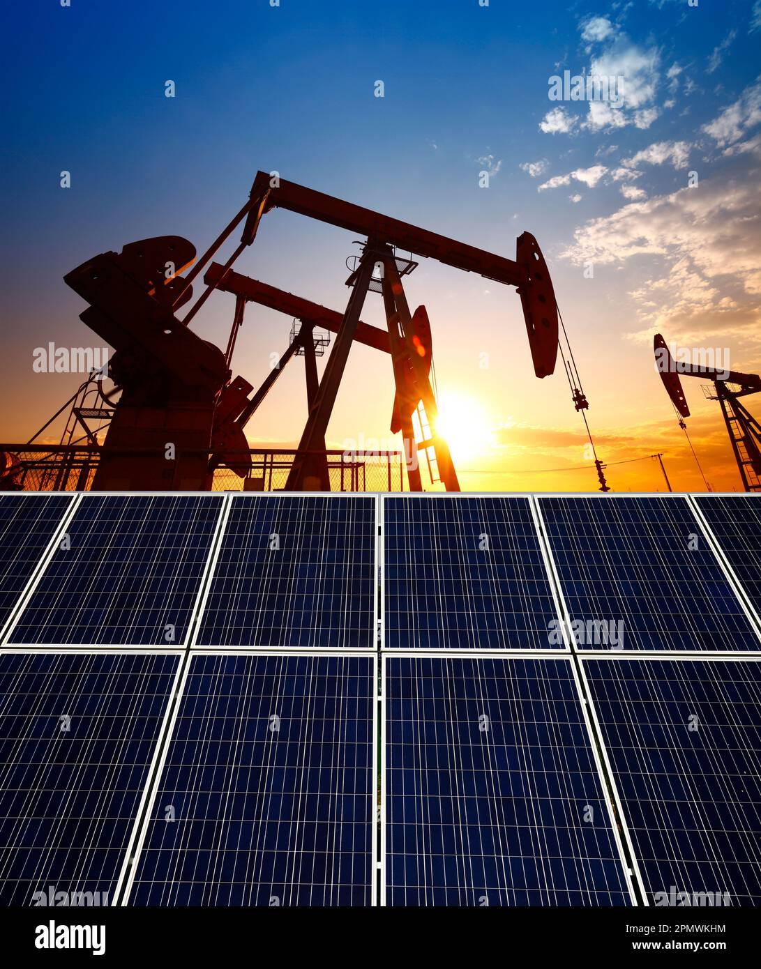 Oil pump with solar panels, industrial equipment Stock Photo - Alamy