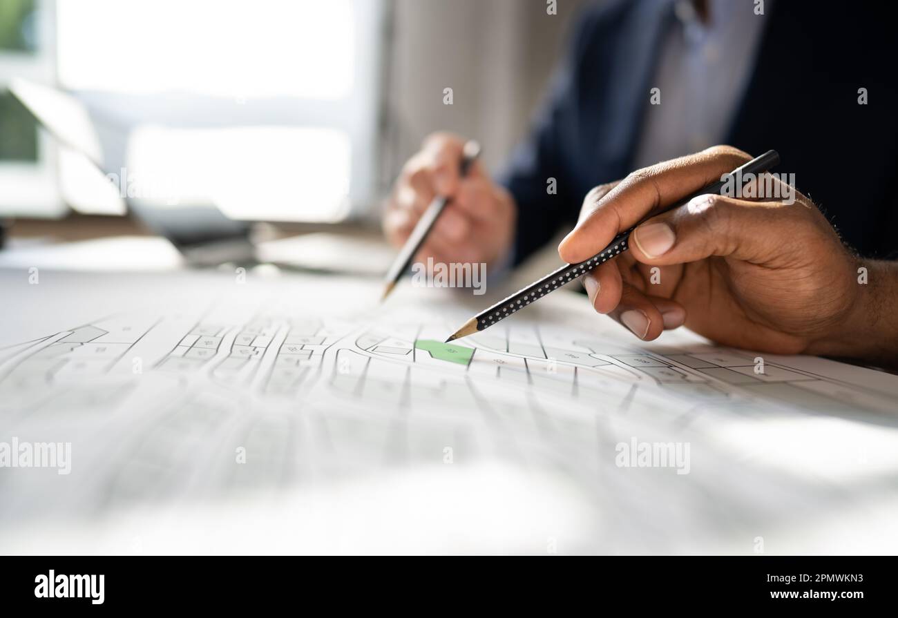 Cadastre Land Map. Cartographer Locating Building Plot Stock Photo - Alamy