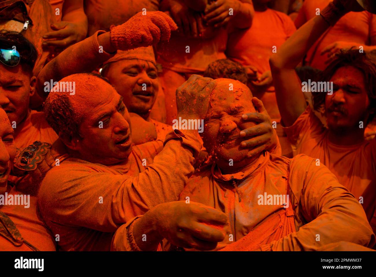 Bhaktapur, Nepal. 15th Apr, 2023. People smear vermilion powder over ...
