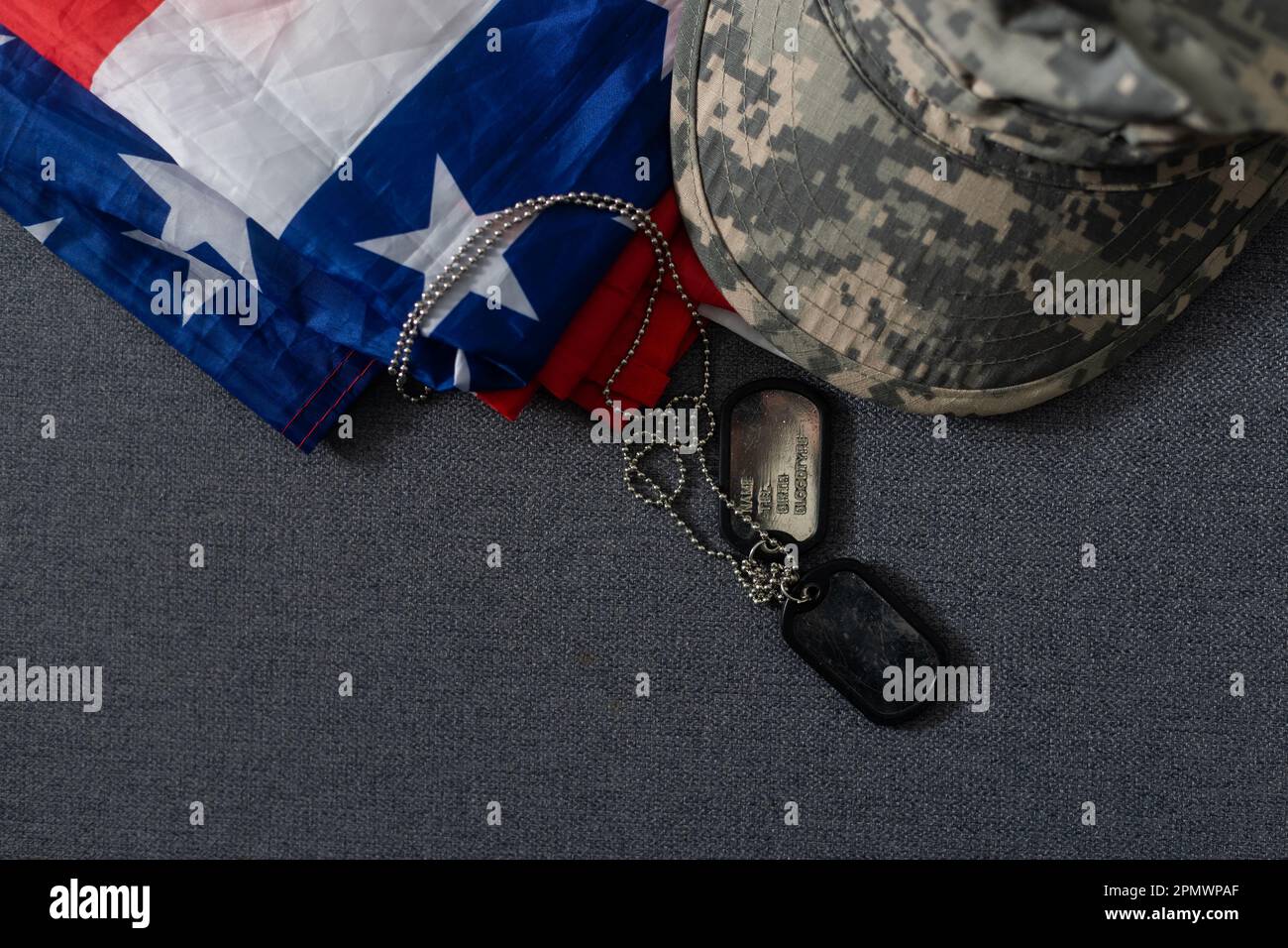 Army tokens on military uniform and USA national flag background Stock ...